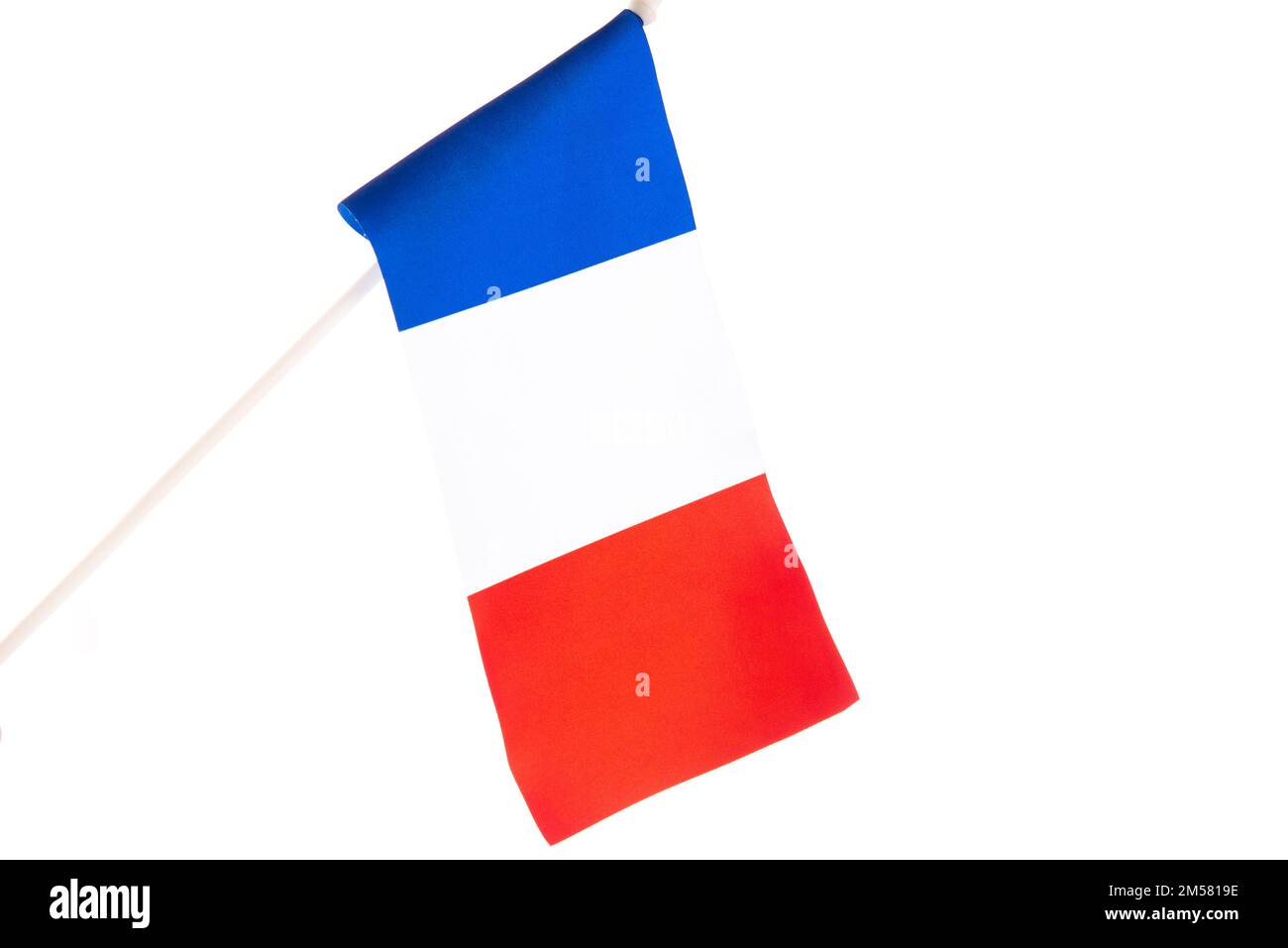 The flag of France on a white background developing flying in the wind ...