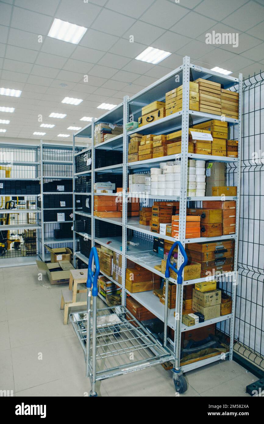 product warehouse in the store. Shelves in the back room. Retail ...