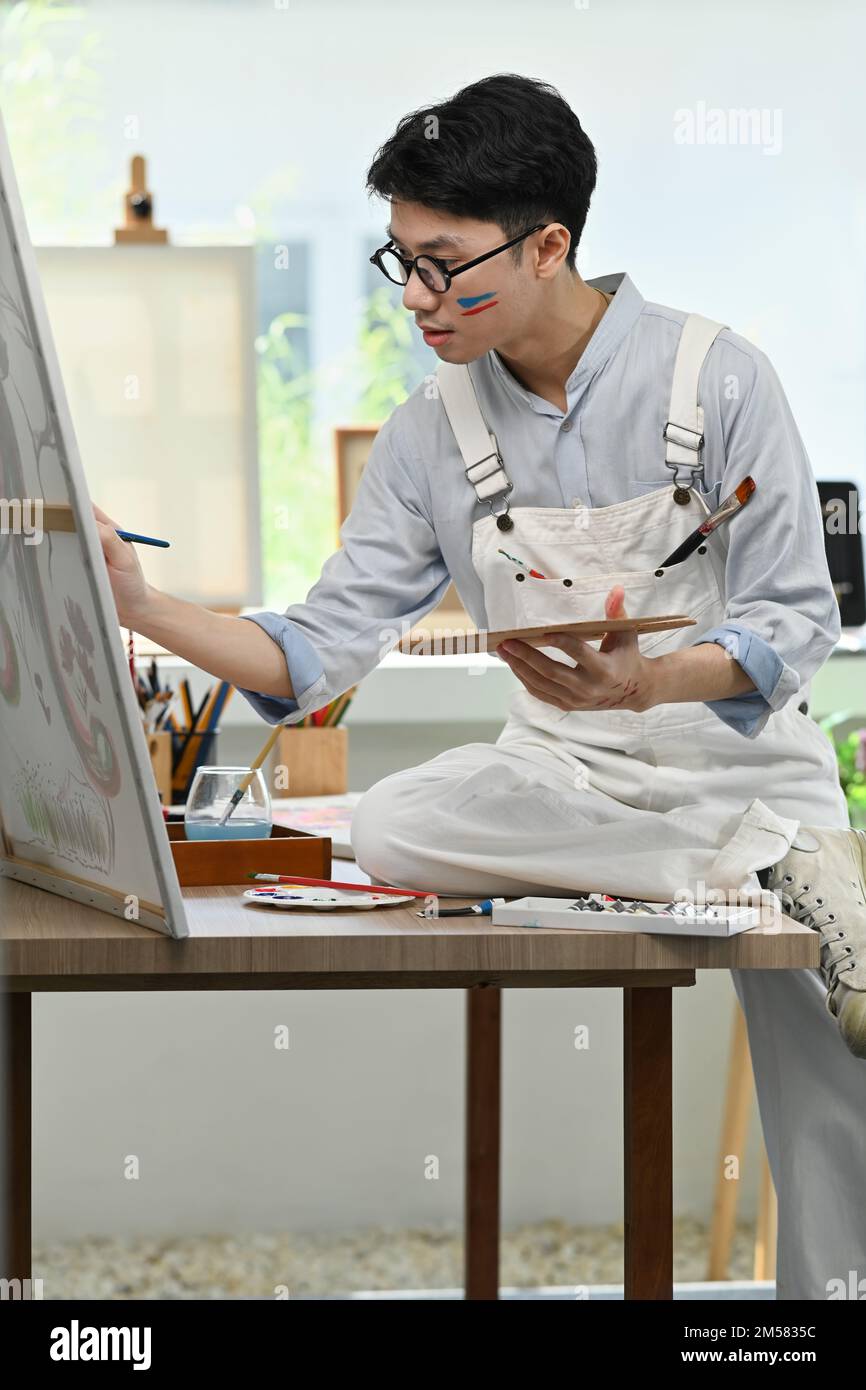 Talented artist drawing picture in hi-res stock photography and images ...