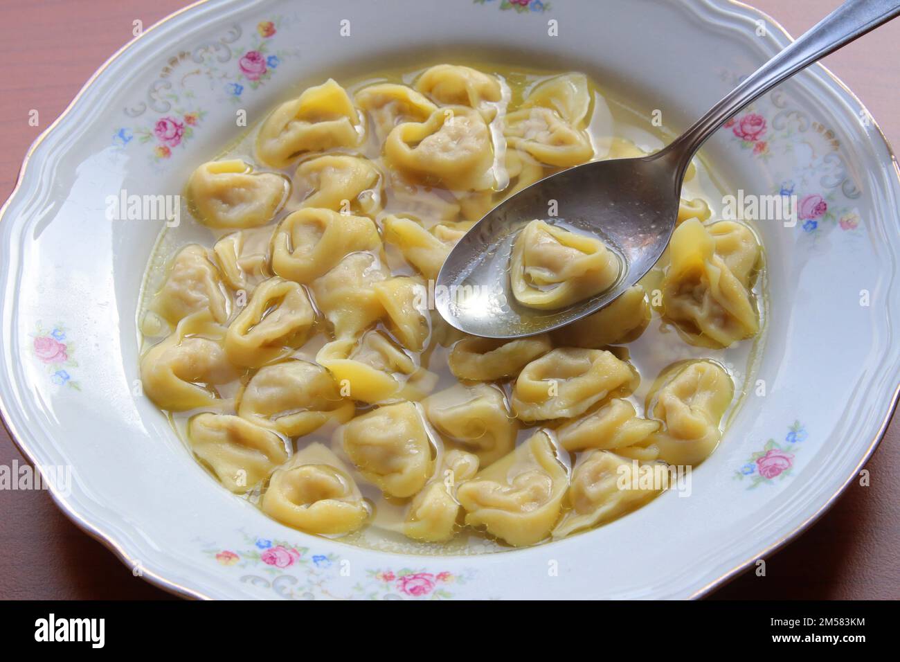 Plate of handmade tortellini, typical Italian main course from Emilia ...