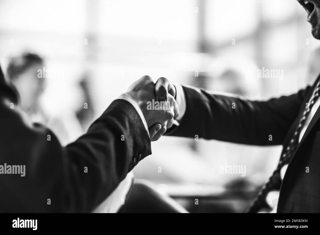 close up. strong handshake of business people Stock Photo - Alamy
