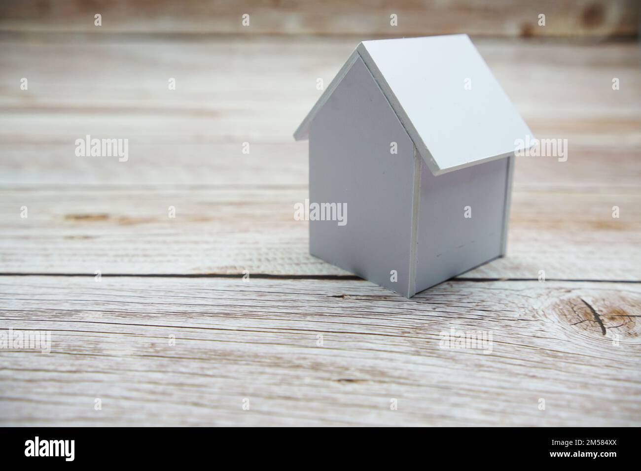 White Model House with space copy on wooden background Stock Photo - Alamy