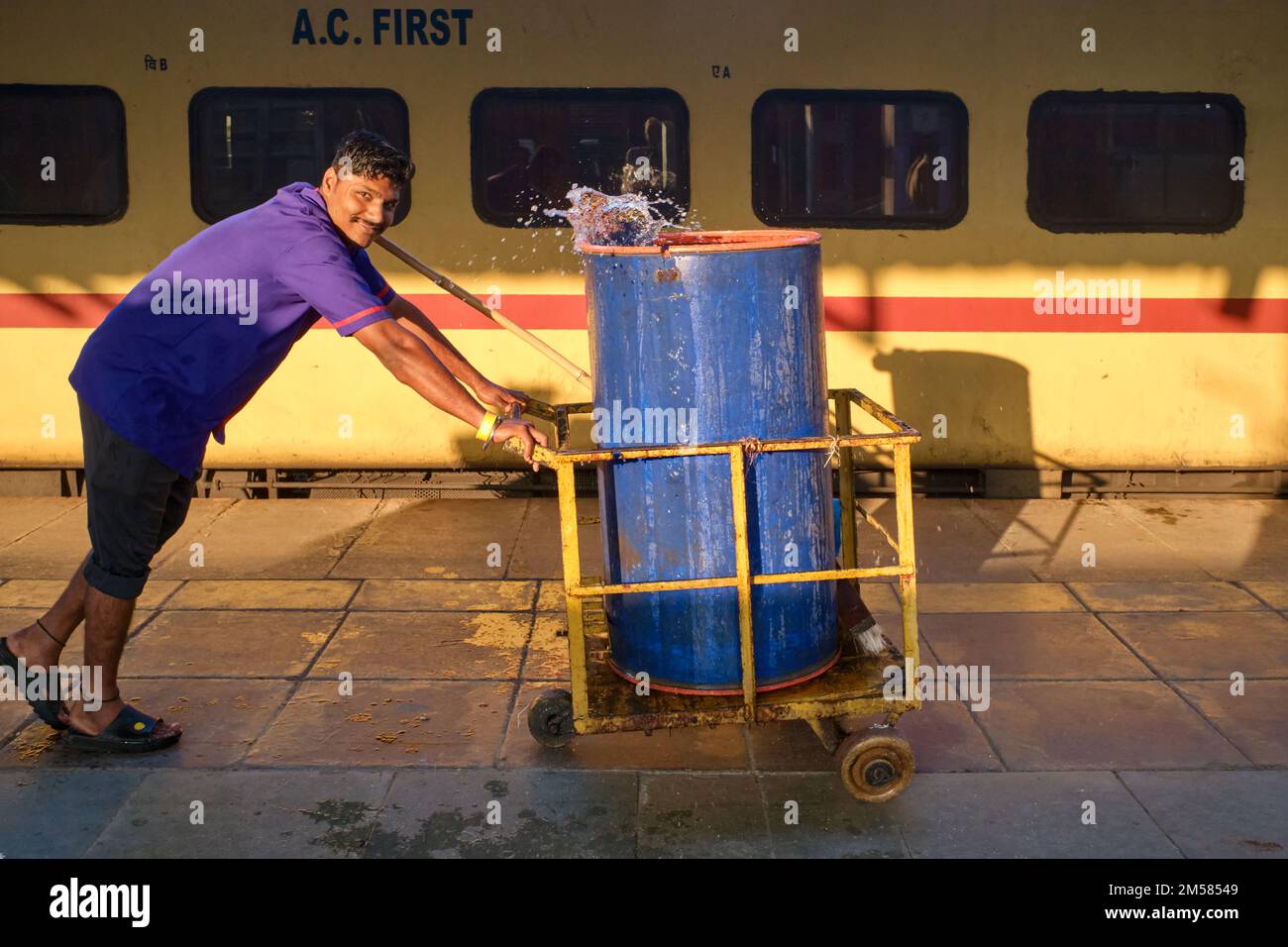A cleaner on at platform at Chhatrapati Shivaji Maharaj Terminus (CSMT ...