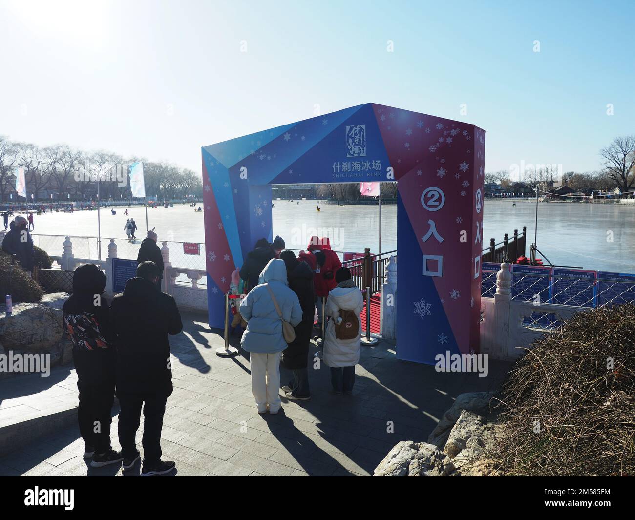 BEIJING, CHINA - DECEMBER 27, 2022 - Visitors play on the ice at ...
