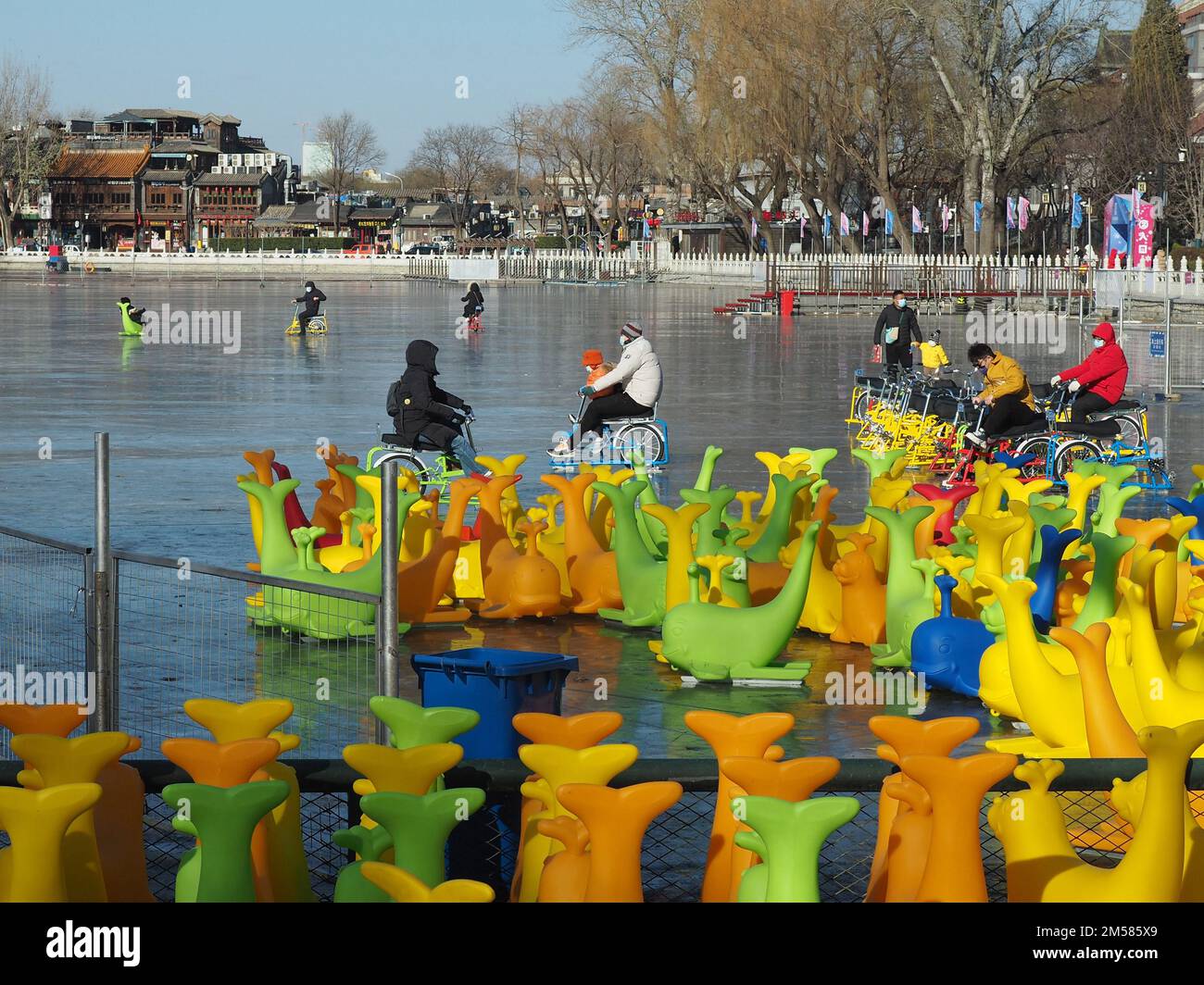 BEIJING, CHINA - DECEMBER 27, 2022 - Visitors play on the ice at ...