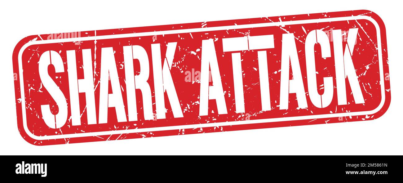 SHARK ATTACK text written on red grungy stamp sign Stock Photo - Alamy