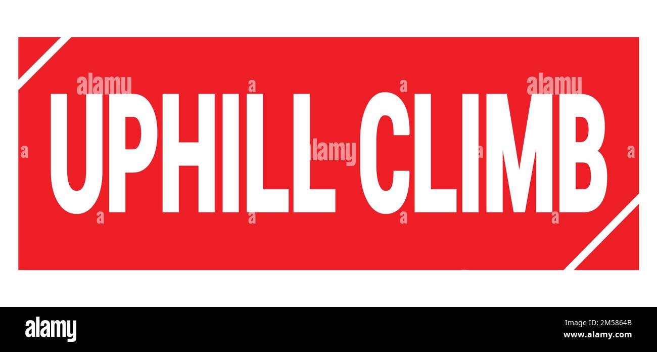 UPHILL CLIMB text written on red grungy stamp sign Stock Photo - Alamy