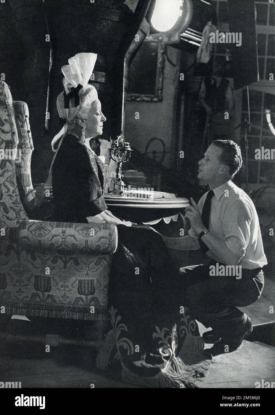 FRANCOISE ROSAY and Director BASIL DEARDEN on set candid during filming ...