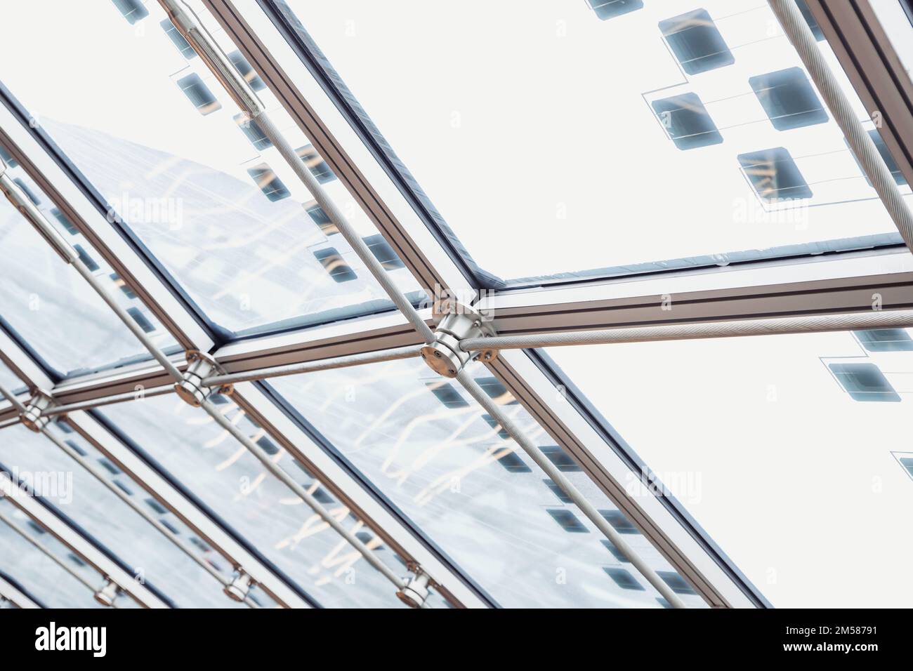 Glass roof with small solar panels, metal steel mount of glass cupola ...