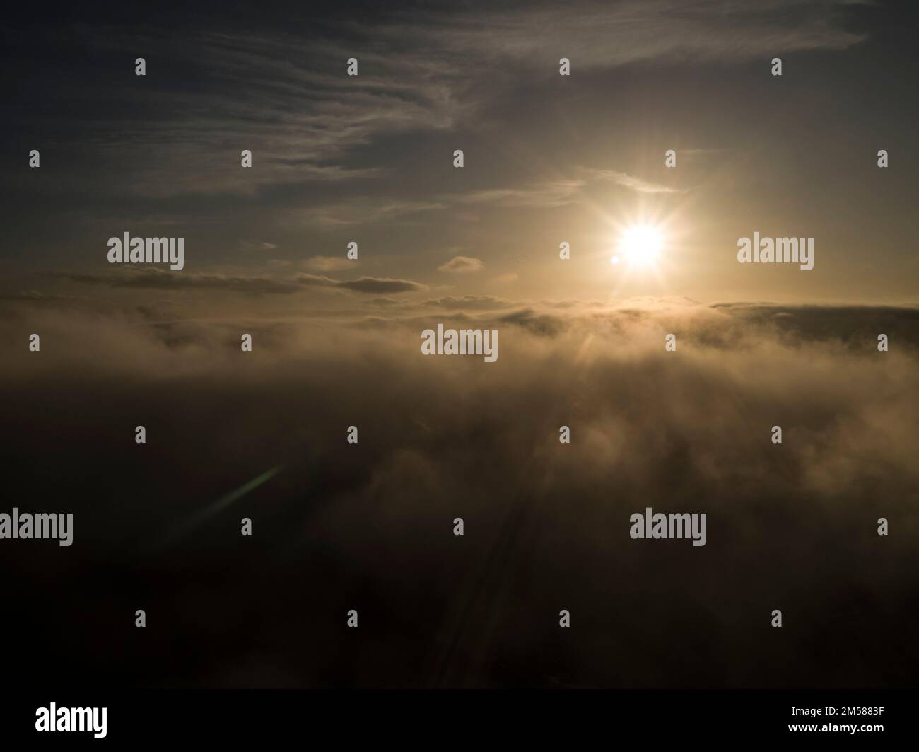 Rising through clouds blue sky hi-res stock photography and images - Alamy