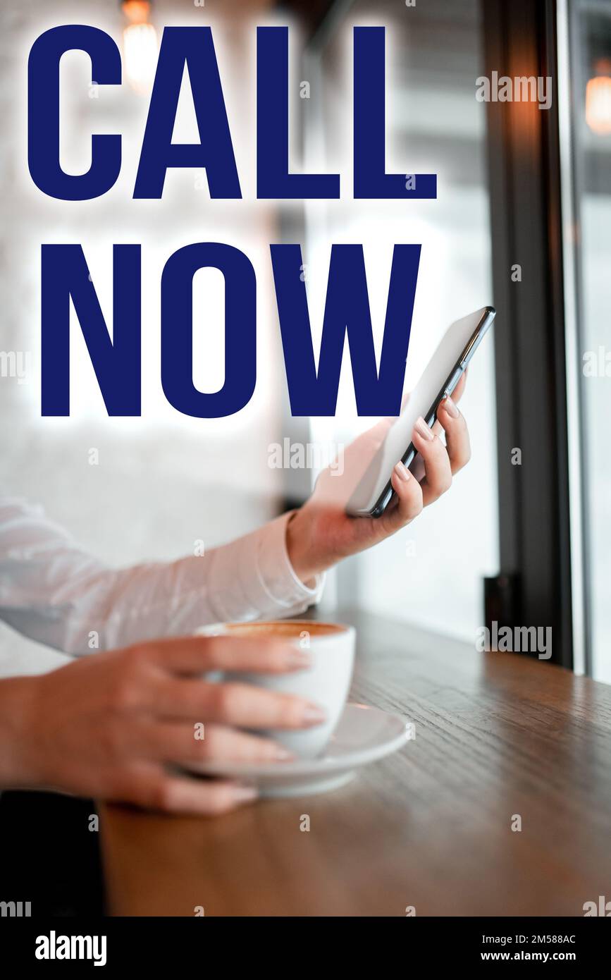 Hand writing sign Call Now. Word for To immediately contact a person ...