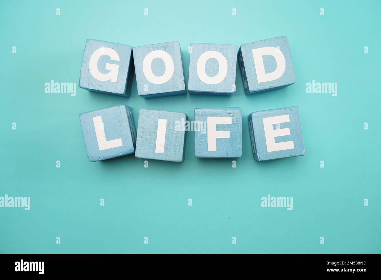 Good Life created with cubes alphabet letters on blue background Stock ...