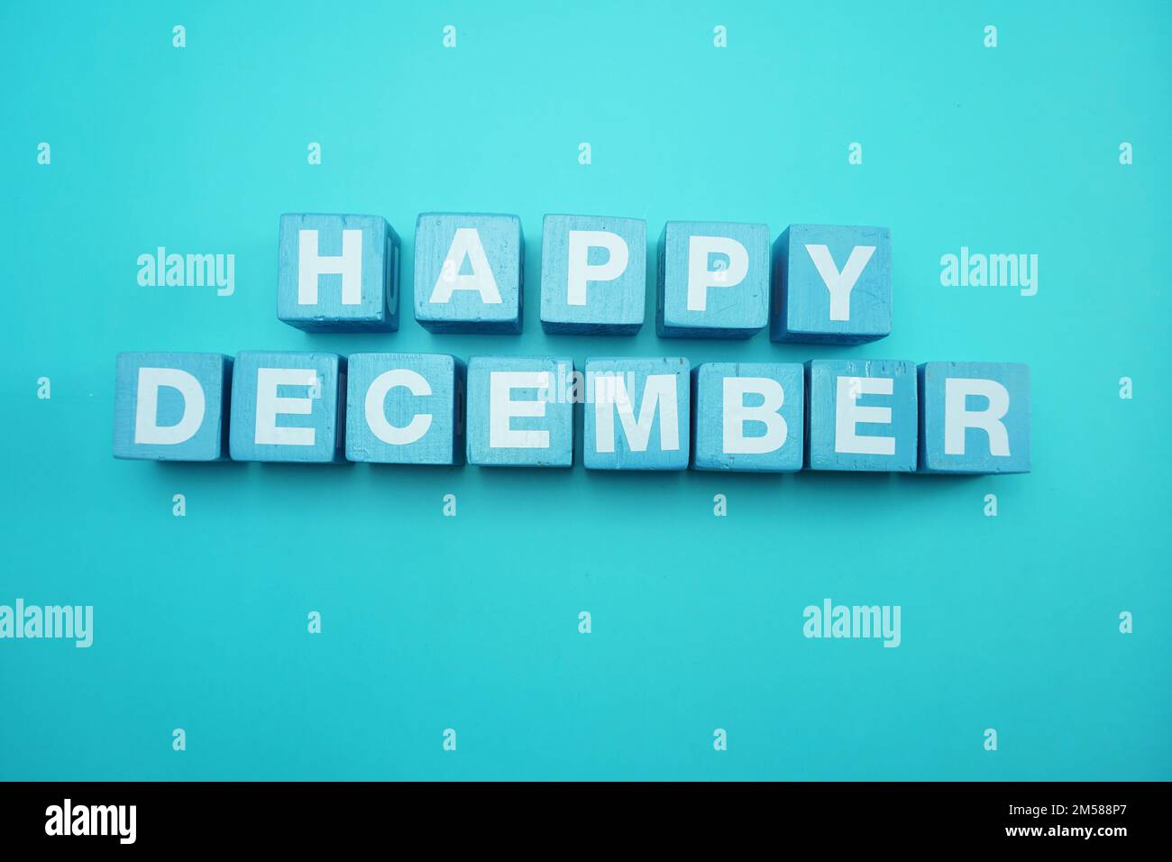 Happy December alphabet letters on blue background Stock Photo - Alamy