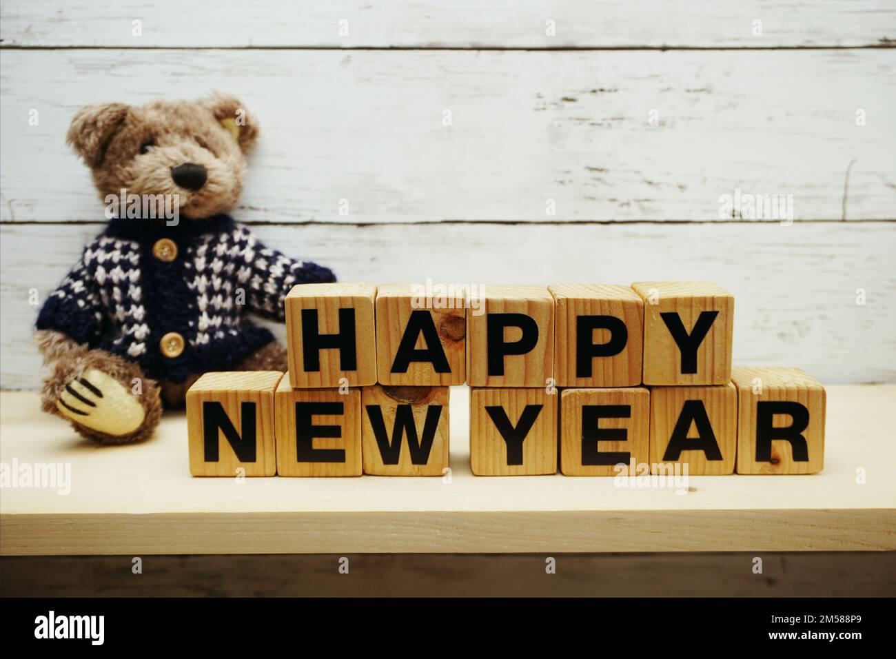 hapy new year alphabet letters on wooden background Stock Photo - Alamy