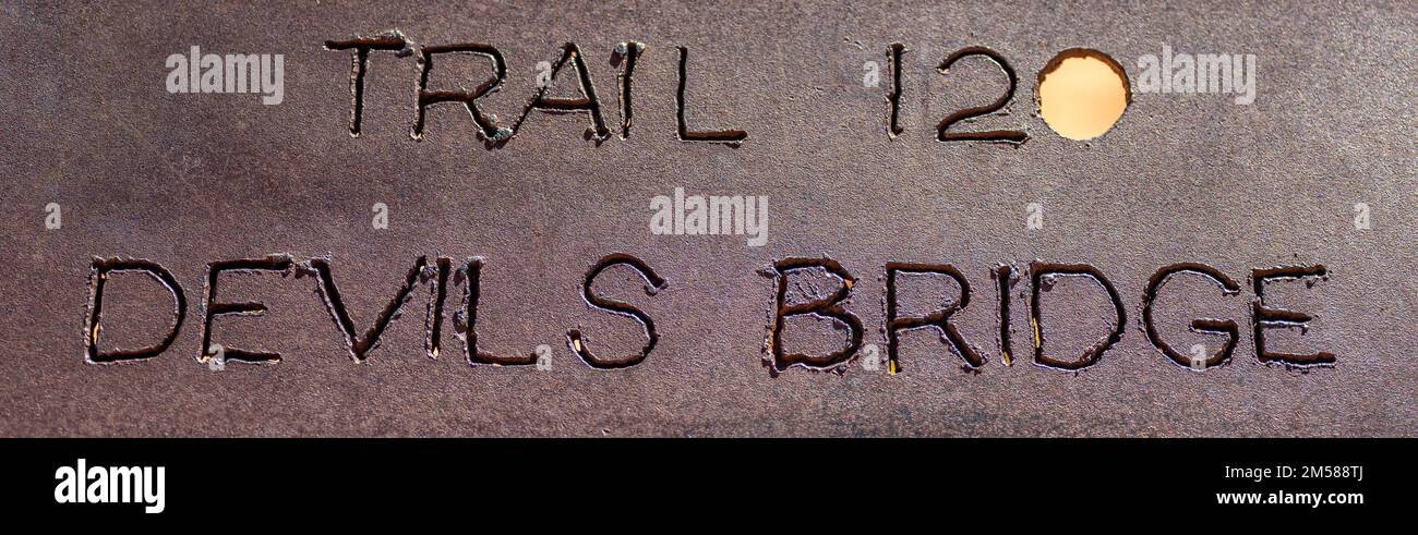 A panoramic shot capturing trail twelve of the devil's bridge sign ...