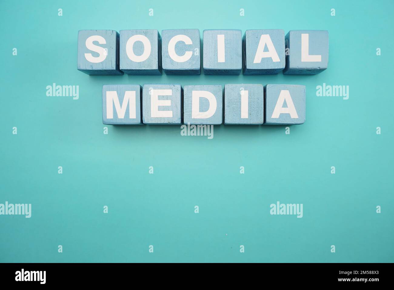 Social Media created with cubes alphabet letters on blue background ...