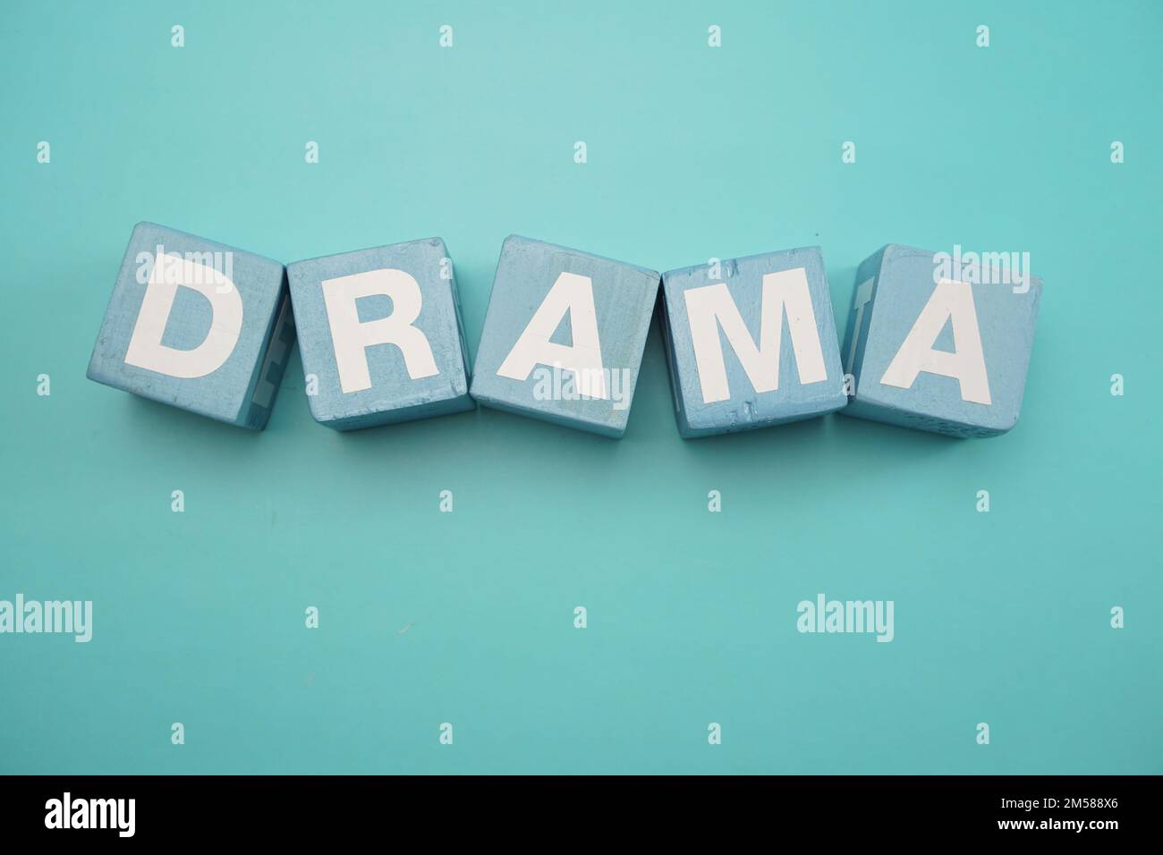 Drama word created with cubes alphabet letters on blue background Stock ...