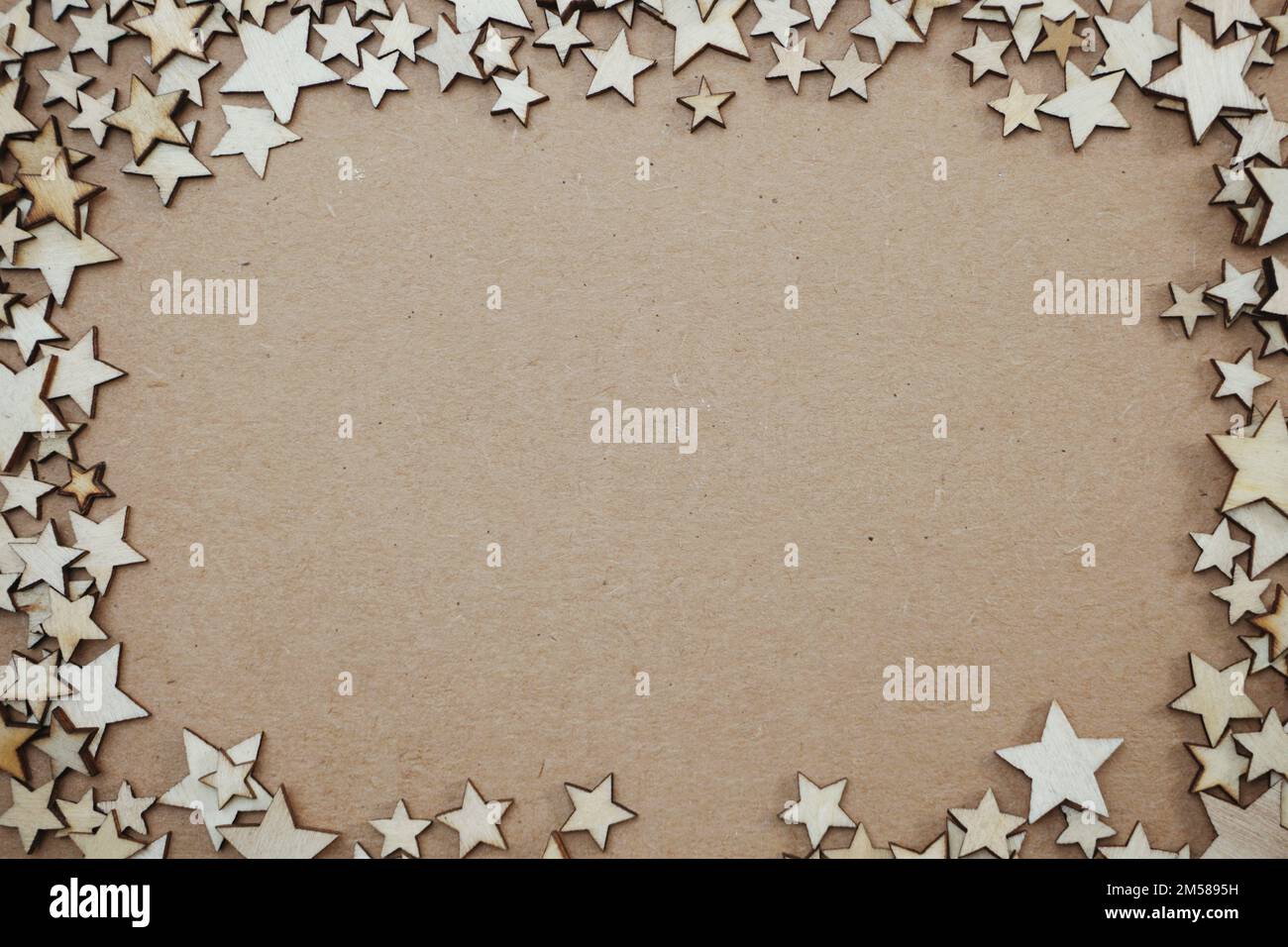 Christmas star frame over on paper craft background Stock Photo - Alamy