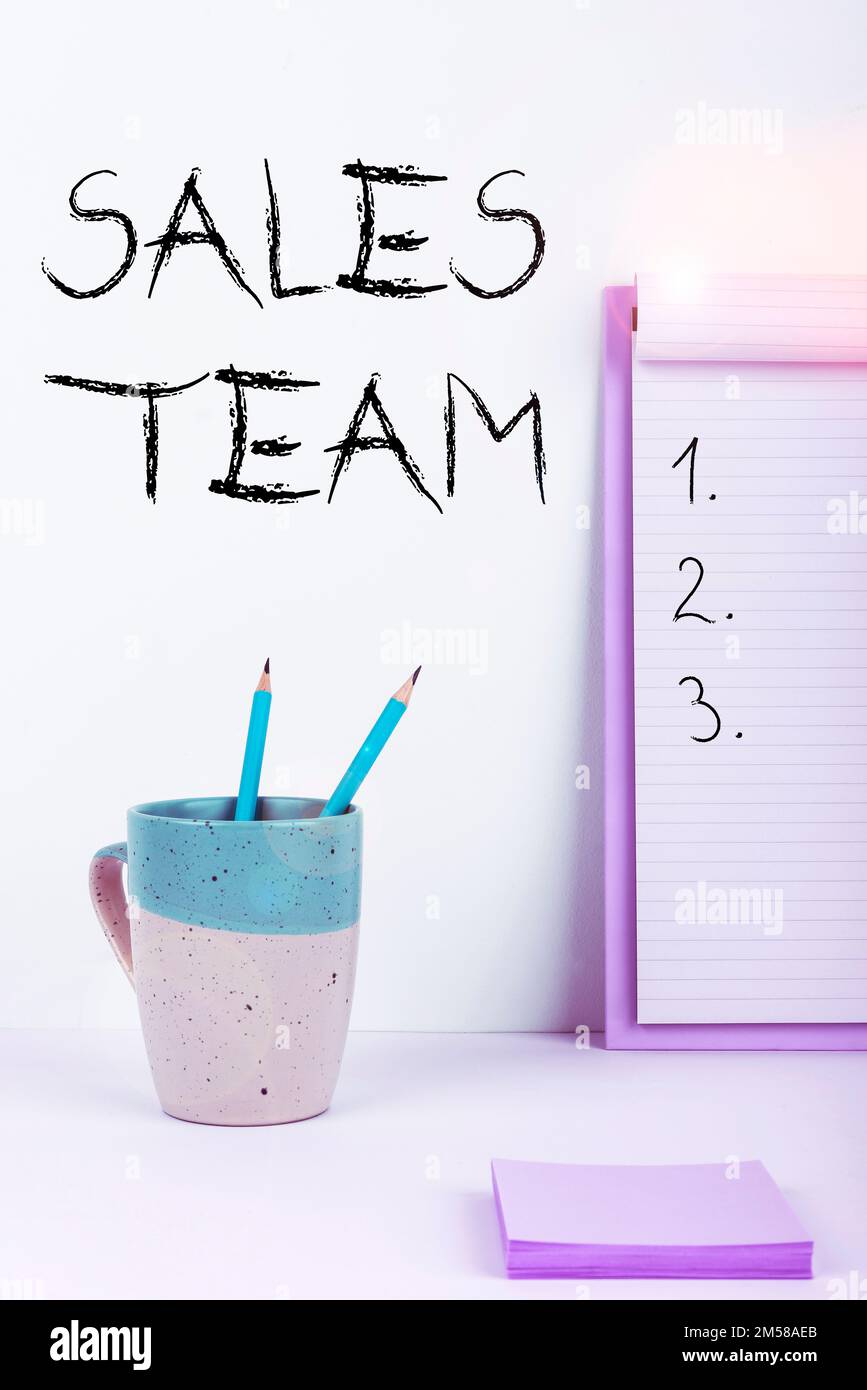 Hand writing sign Sales Team. Business idea they are responsible for of ...