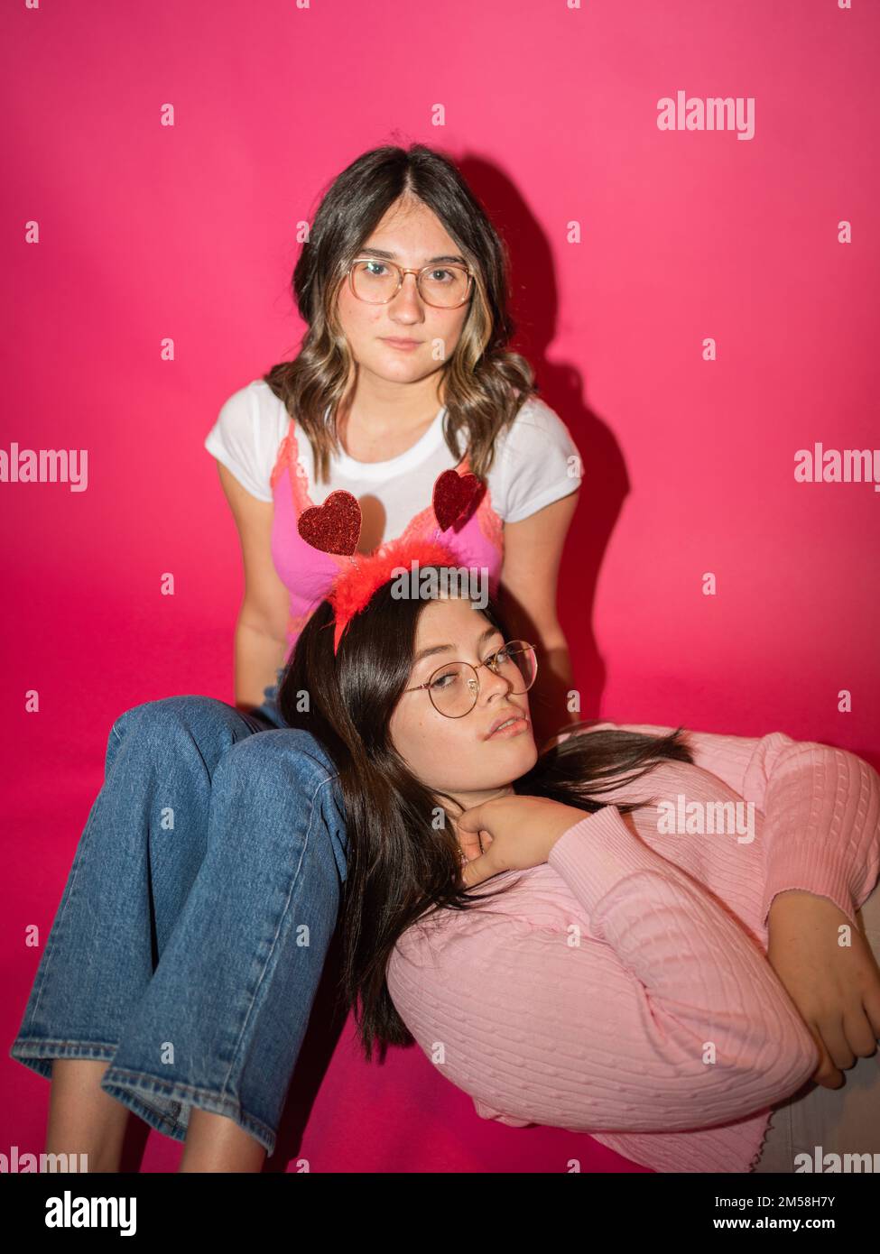 Valentines photoshoot with women in studio Stock Photo - Alamy