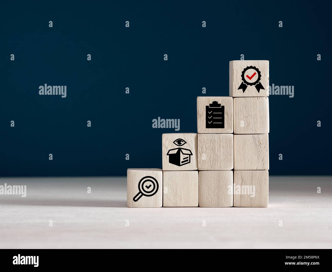 Quality control concept in industry. Stacked wooden cubes with quality ...