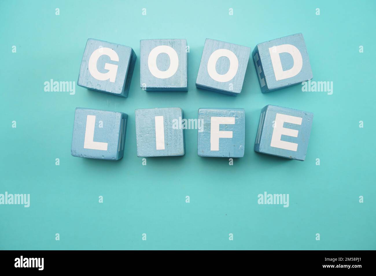 Good Life created with cubes alphabet letters on blue background Stock ...