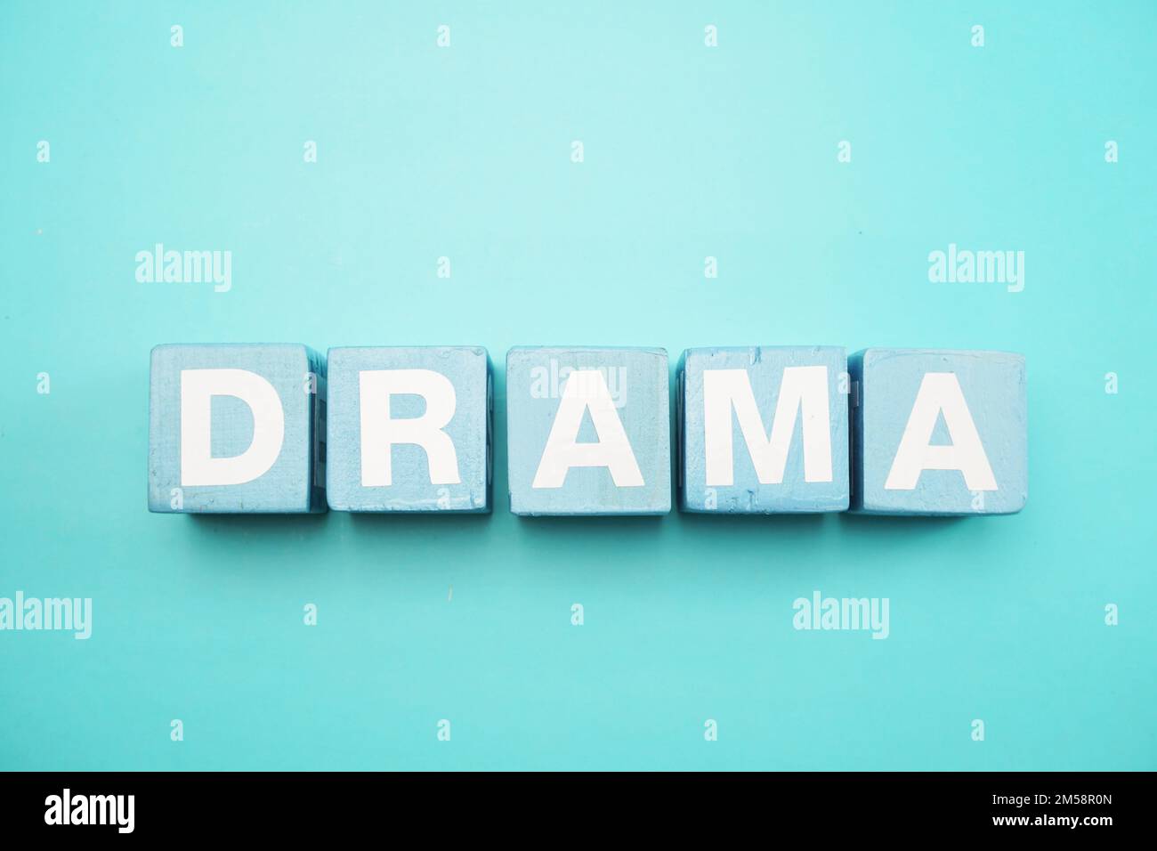 Drama word created with cubes alphabet letters on blue background Stock ...