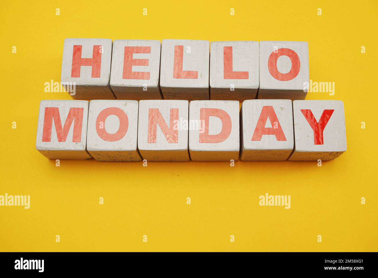 Hello Monday wooden letter alphabet on yellow background Stock Photo ...