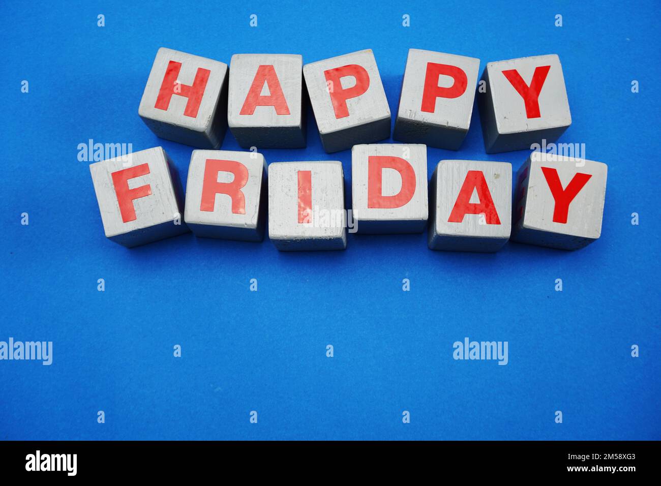 Happy Friday wooden letter alphabet on Blue background Stock Photo - Alamy