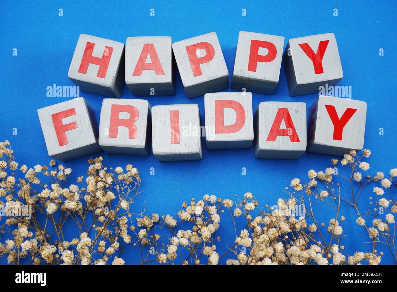 Happy Friday wooden letter alphabet on Blue background Stock Photo - Alamy