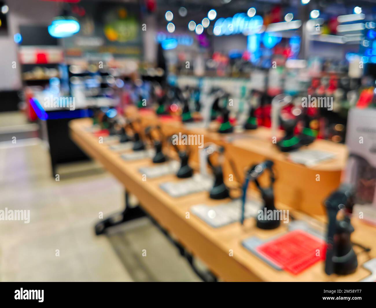 Showcase with smartwatches in the modern electronics store. Buy a smart ...