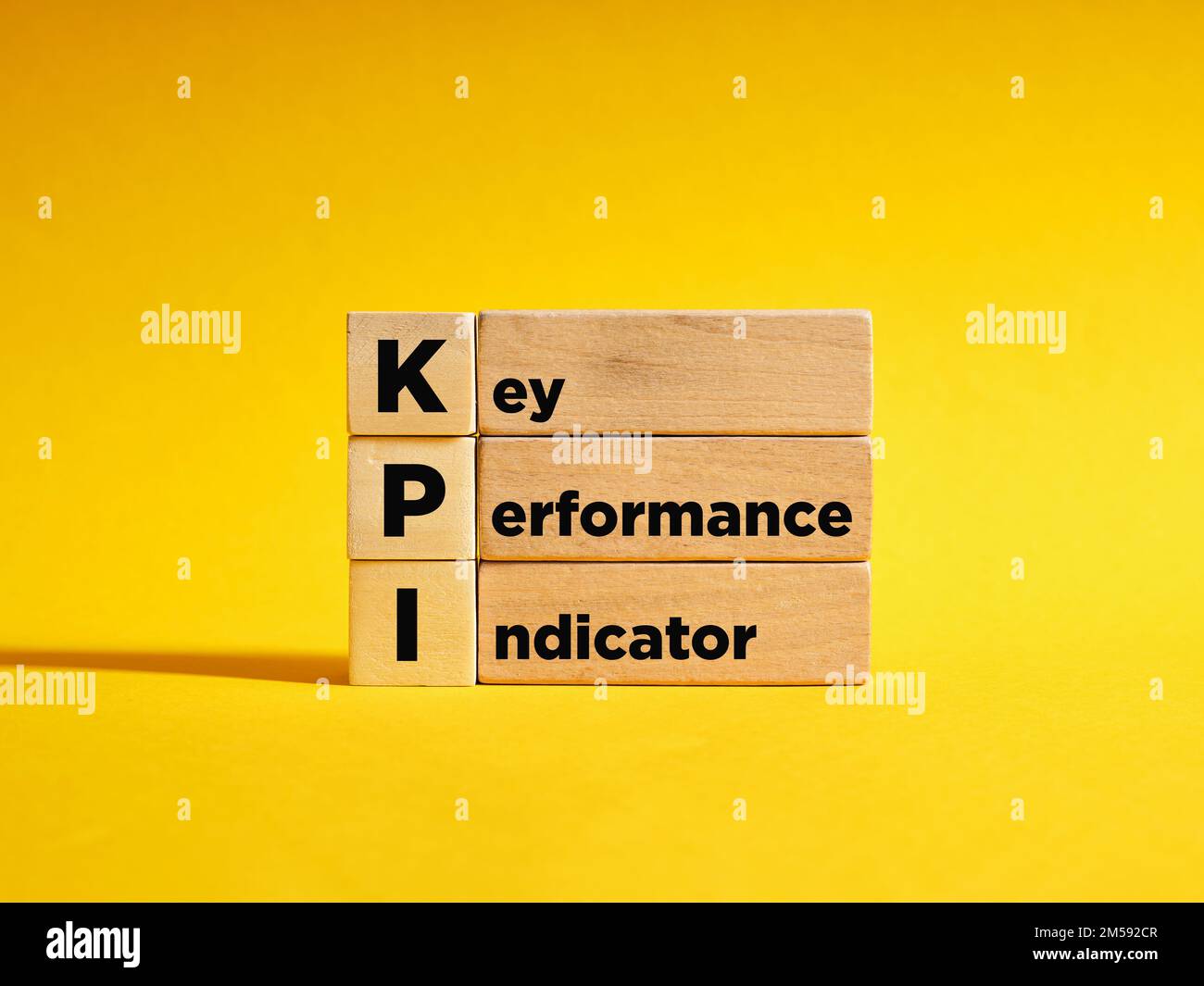 Wooden Cubes With The The Abbreviation Kpi Key Performance Indicator