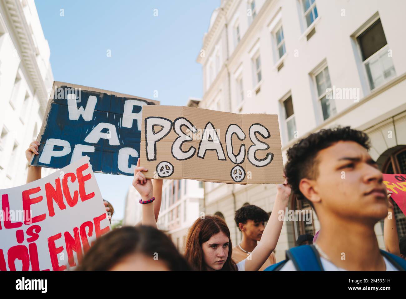 Generation Z standing up against war and violence. Multicultural youth ...