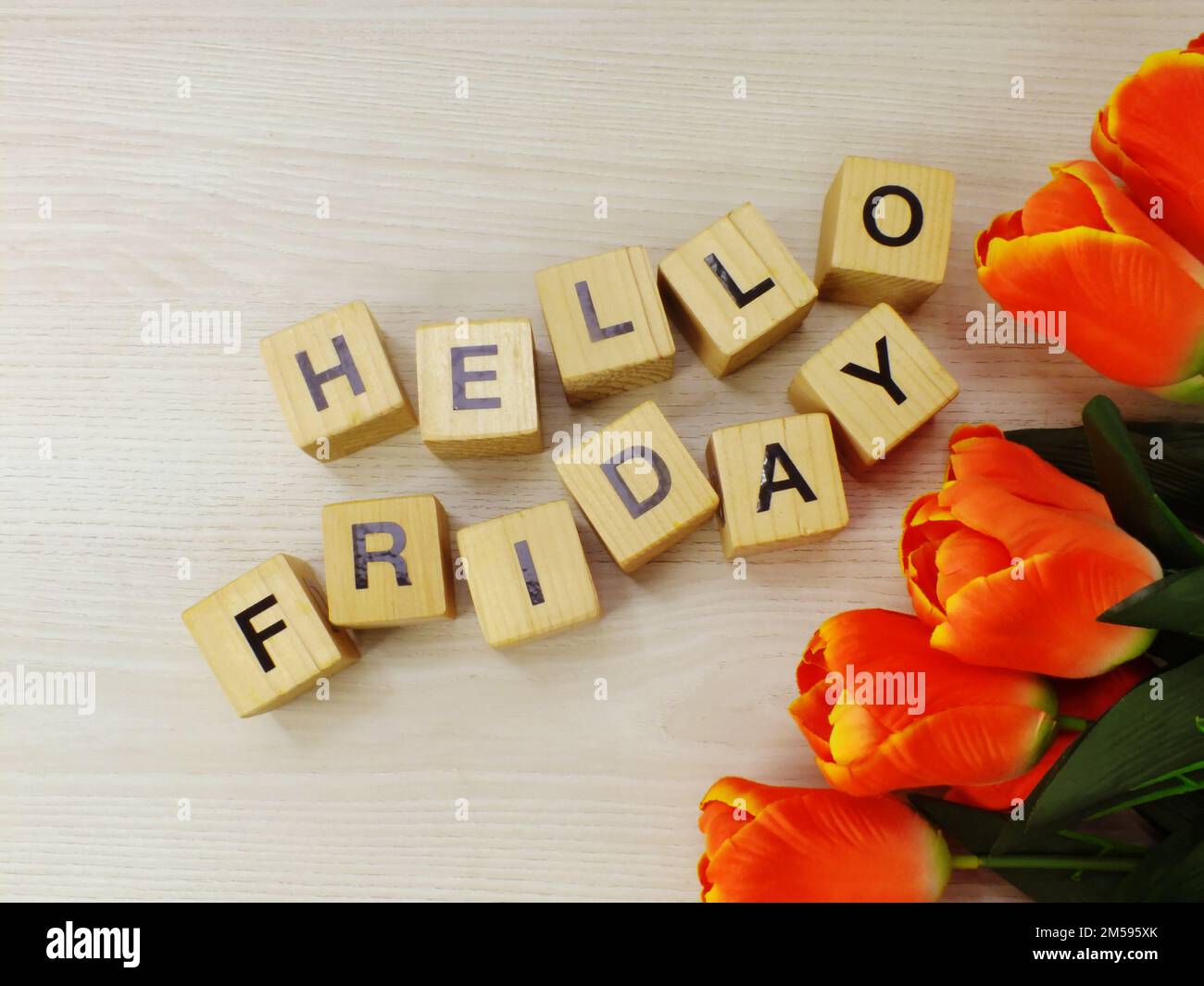 hello friday wooden alphabet on wooden background Stock Photo - Alamy