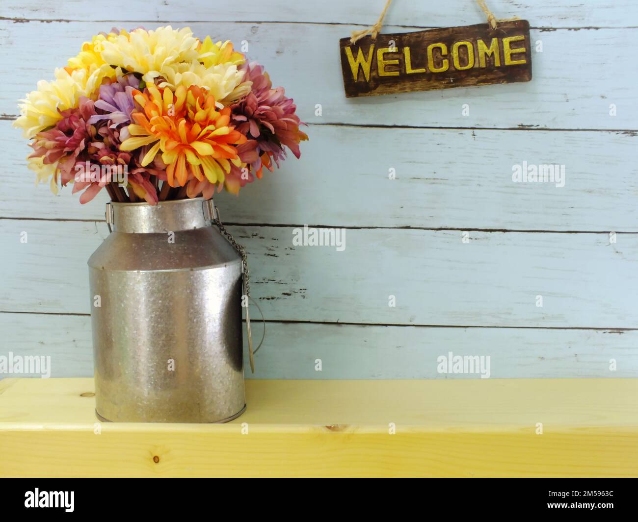 welcome sign and flower bouquet with space copy background Stock Photo ...