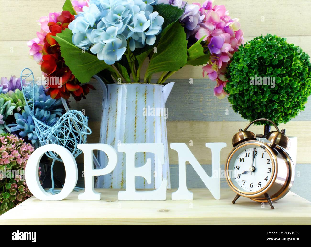 open wooden letter alphabet on wooden background Stock Photo - Alamy