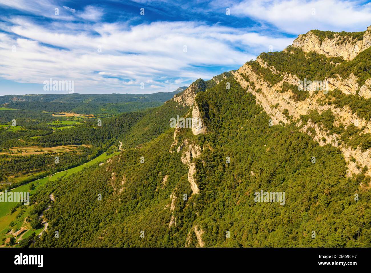 Aerial view of the mountains and forests of Queral from the monastery ...