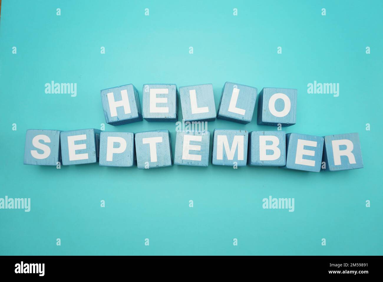 hello september alphabet letters on blue background Stock Photo - Alamy