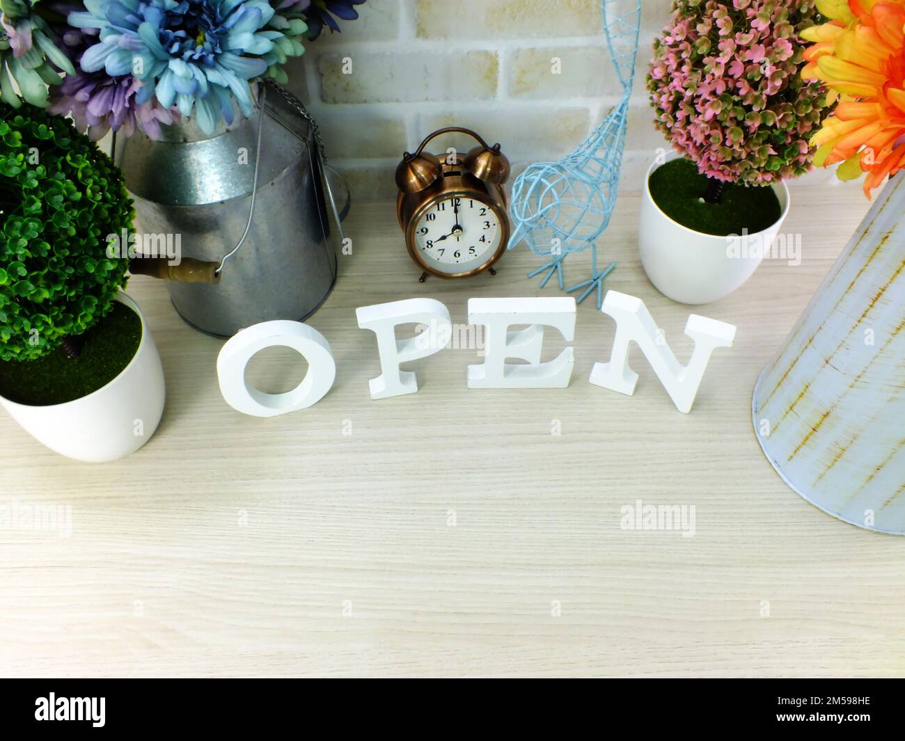 open wooden letter alphabet on wooden background Stock Photo - Alamy