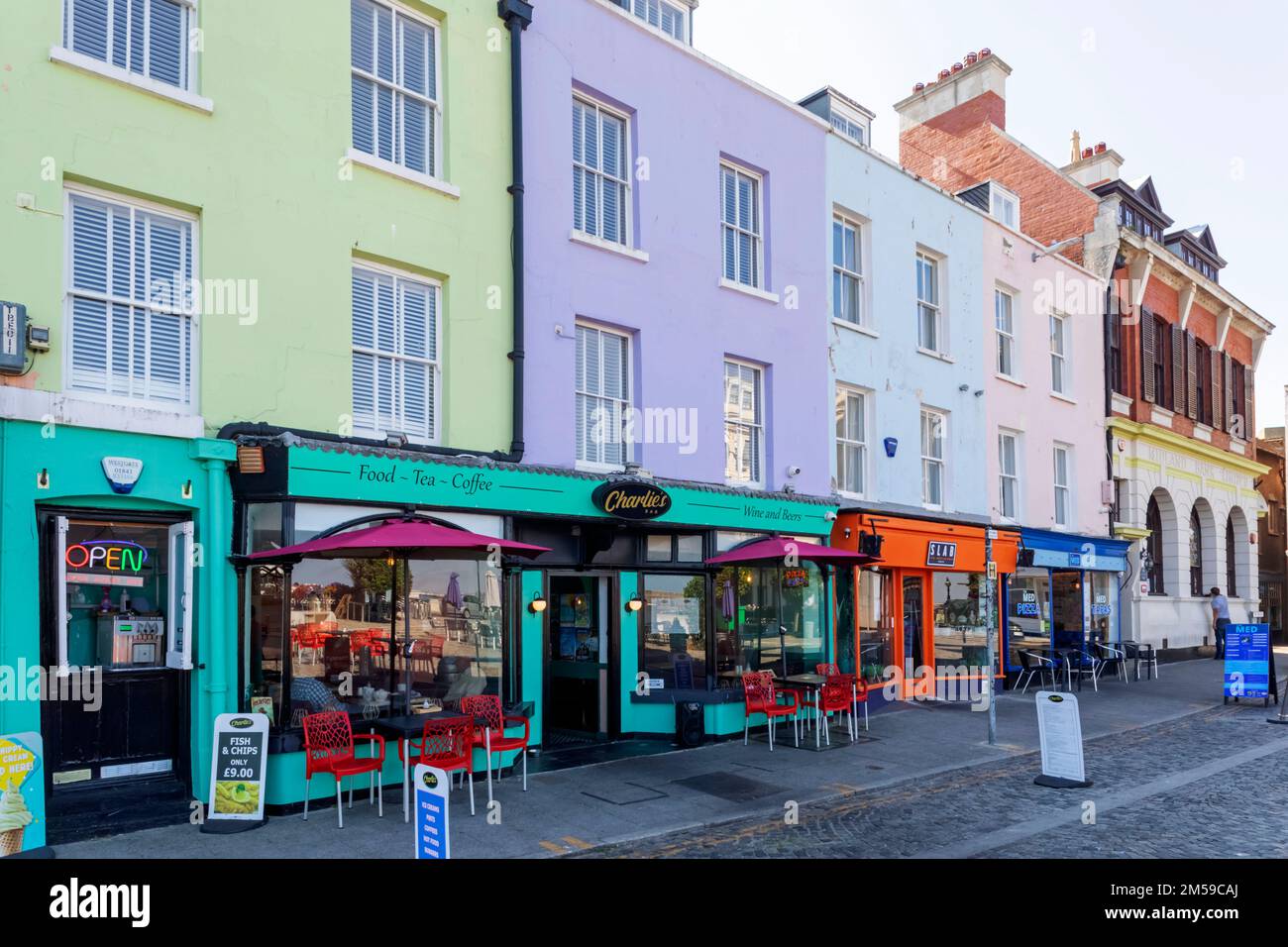Old town colourful seafront cafes and restaurants hi-res stock ...