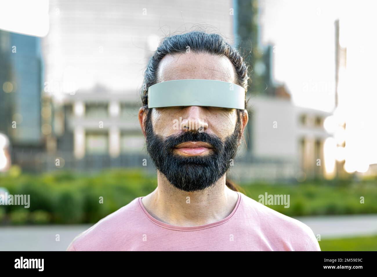 Hispanic adult man wearing hi-tech goggles fo augmented reality ...