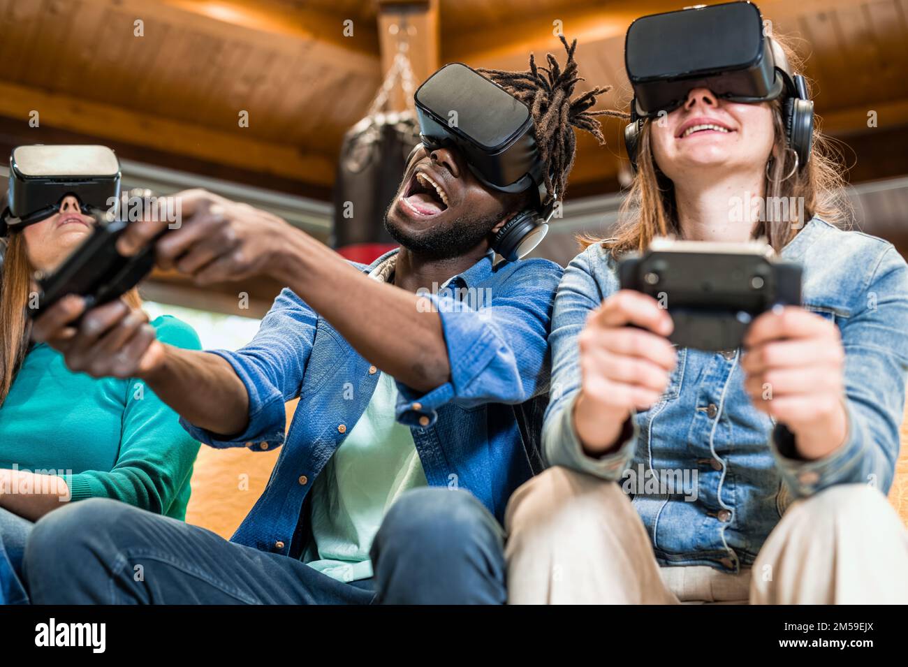 Happy Friends Having Fun Playing Modern Games With Virtual Simulator Multiracial Group Of Gen Z
