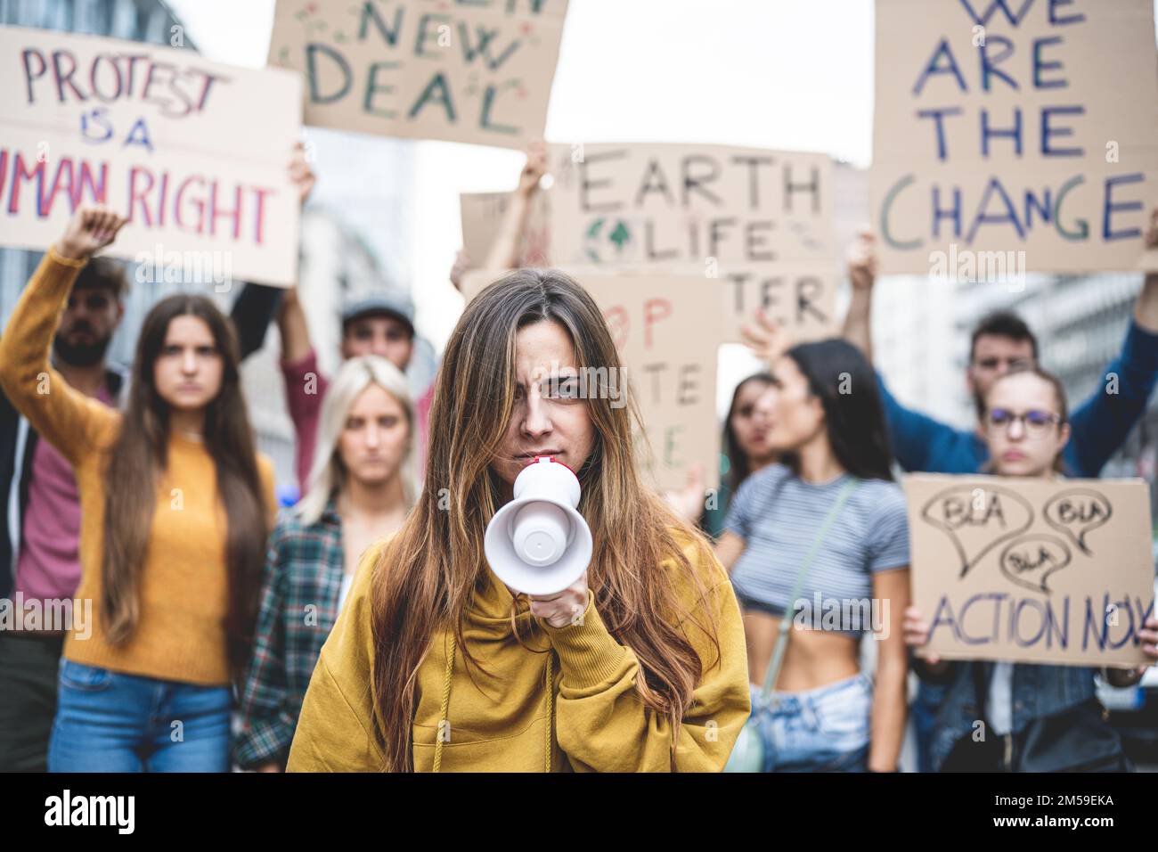 Protests about climate change, close-up of a young Gen Z girl with ...
