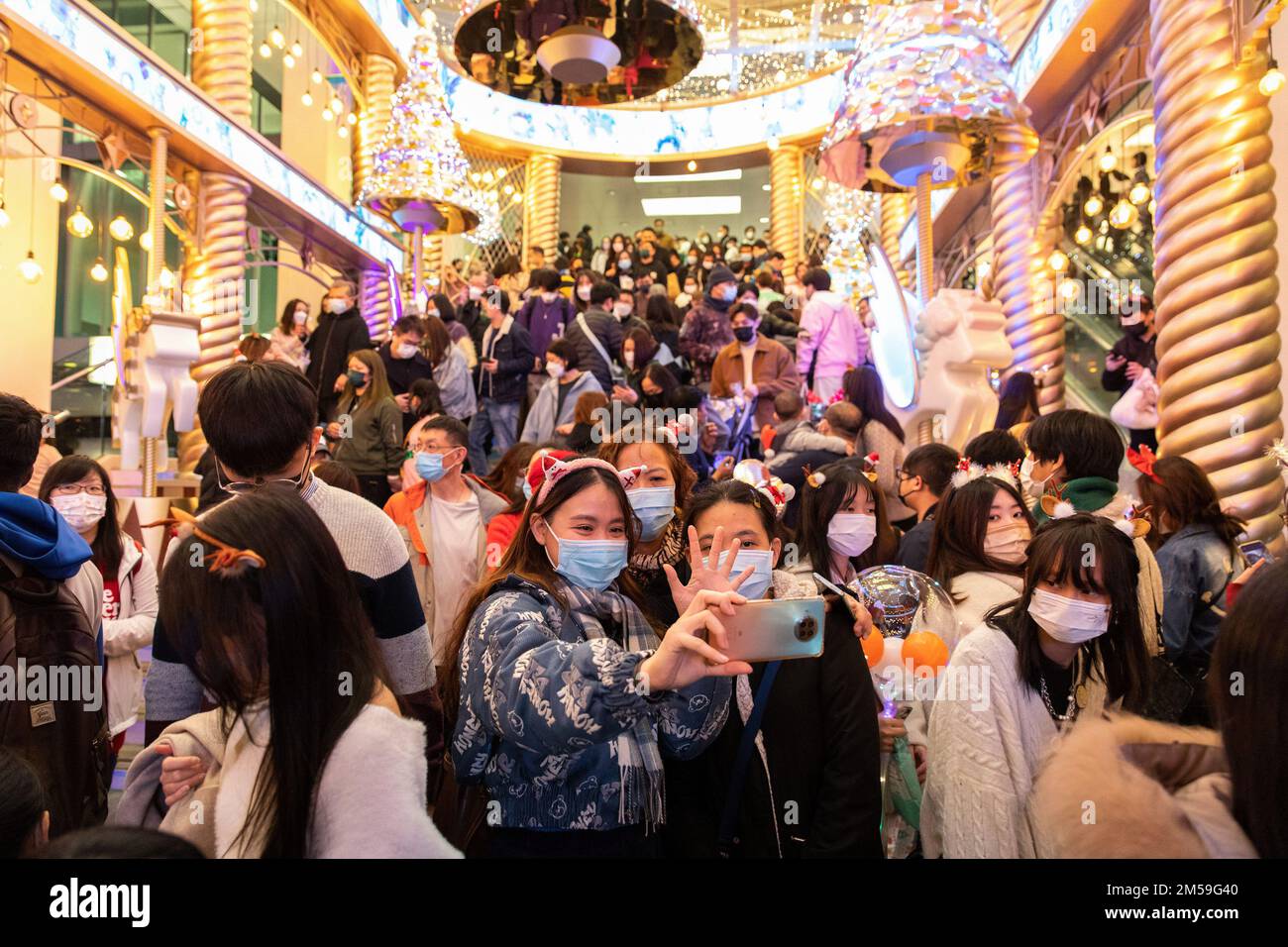 People flocked to see the Christmas lights at a shopping mall in Hong ...