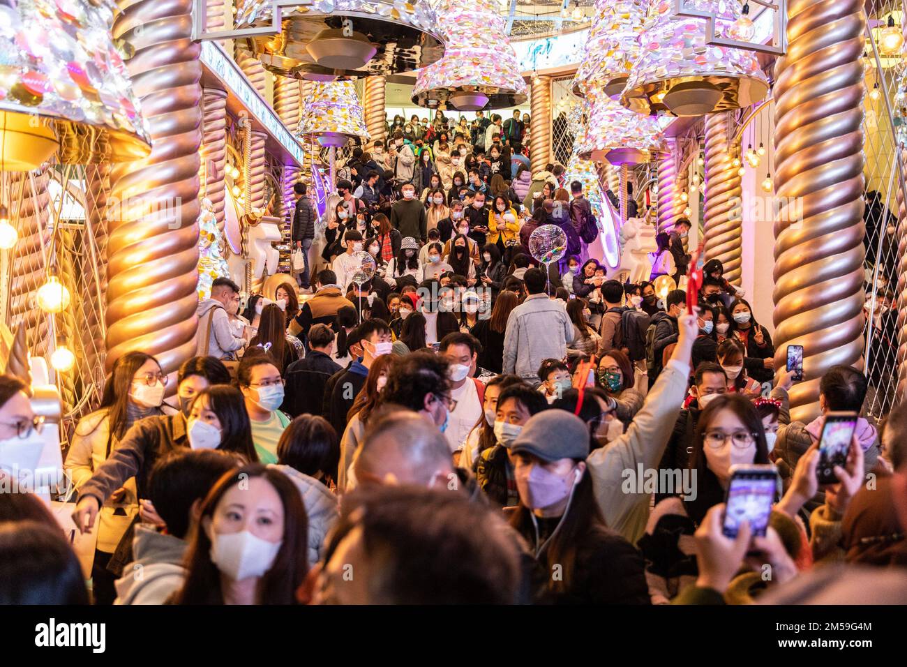 People flocked to see the Christmas lights at a shopping mall in Hong ...