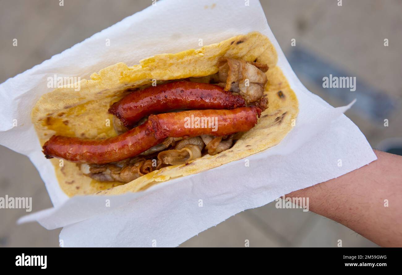 Talo, a basque corn tortilla stuffed with Txistorra, the most typical ...