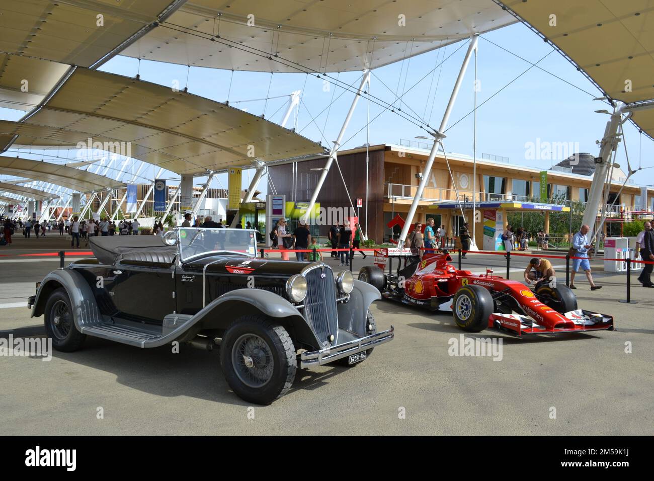 Exposition of the red model of Ferrari racing car SF15-T and the car OM ...