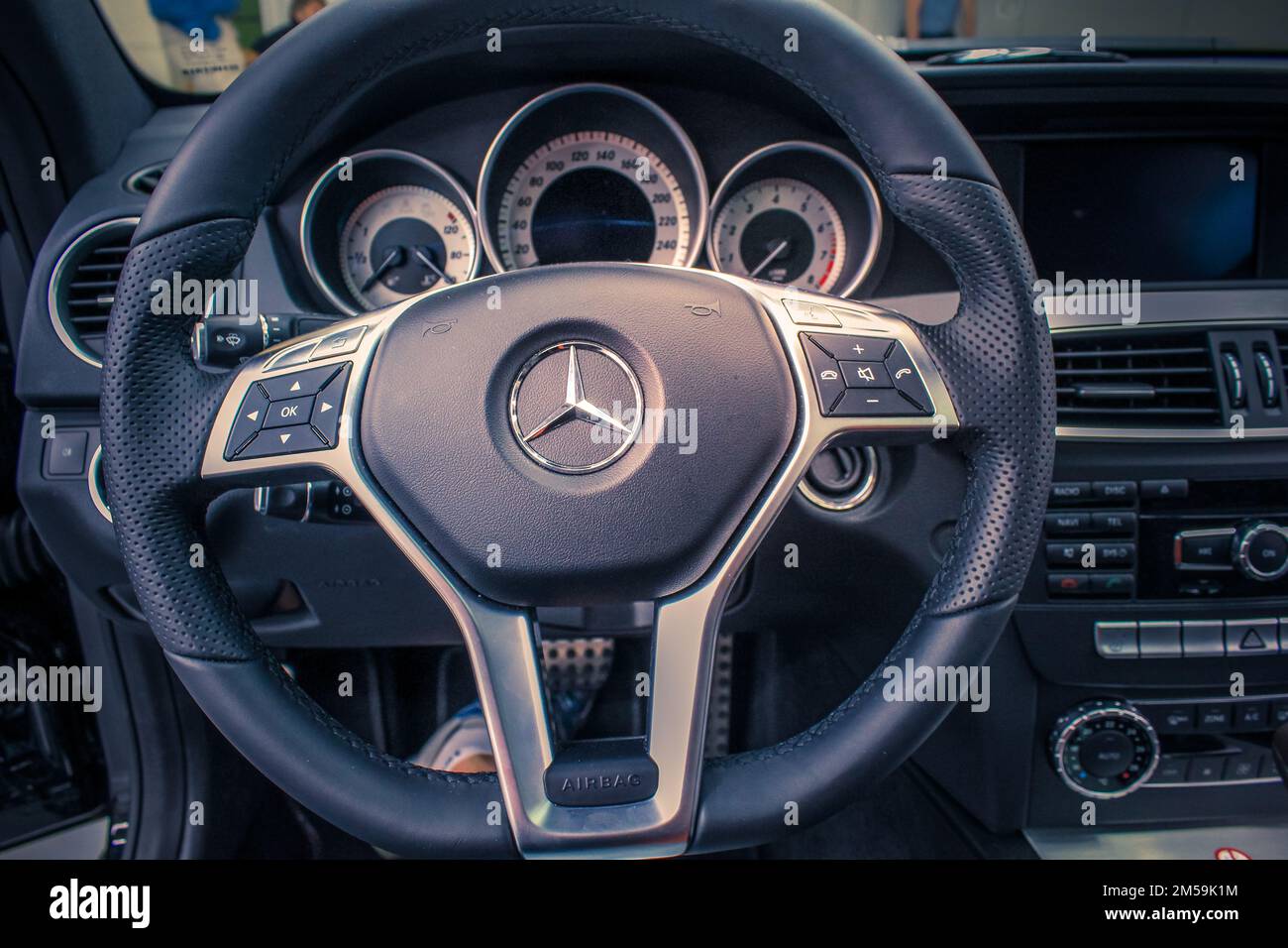 Bremen, Germany 2013. Steering wheel with control panel in a Mercedes ...