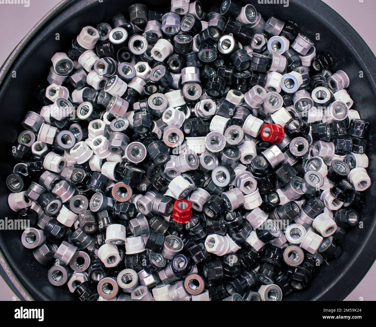 Colored bolt nuts for mounting wheels on the car, top view Stock Photo ...