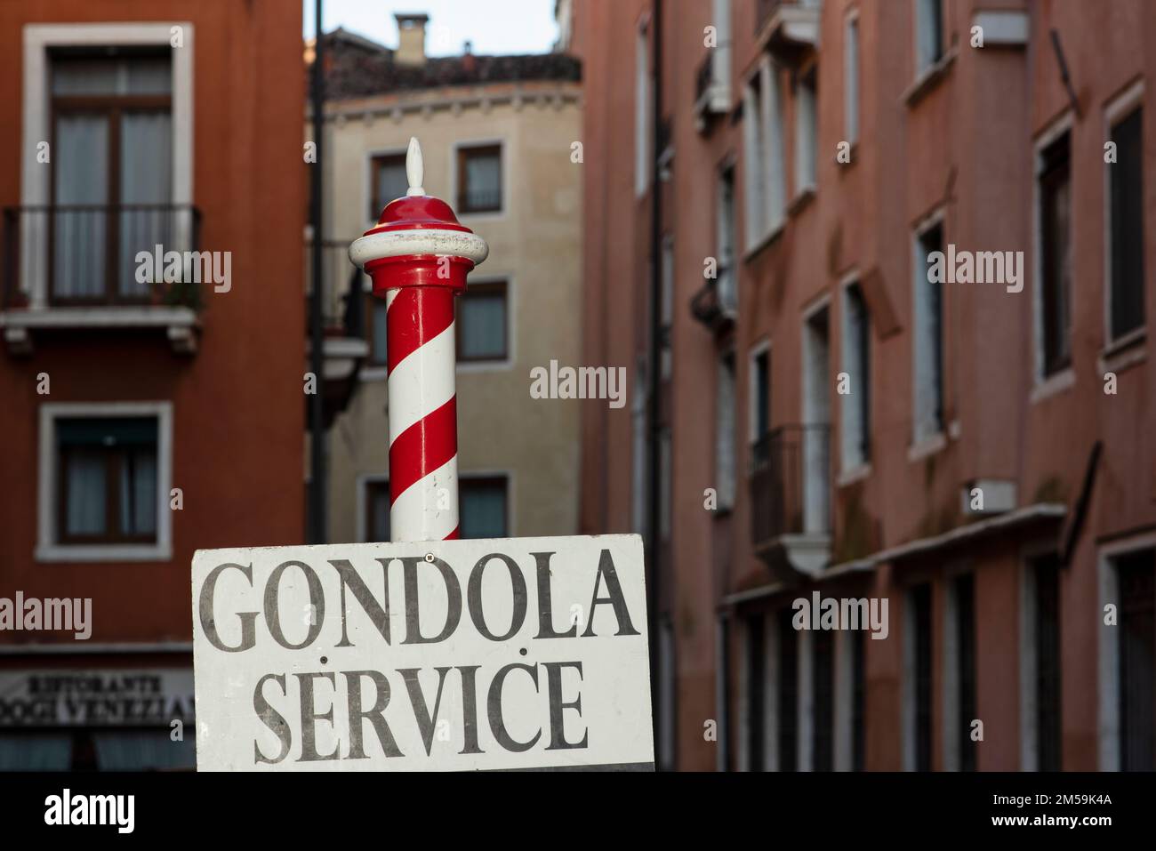 Gondola service sign in the city of Venice in Italy Stock Photo - Alamy